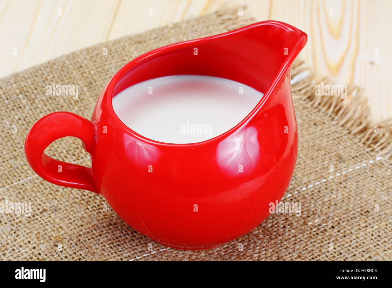 Milk in a Red Earthen Pot Studio Photo Stock Photo - Alamy
