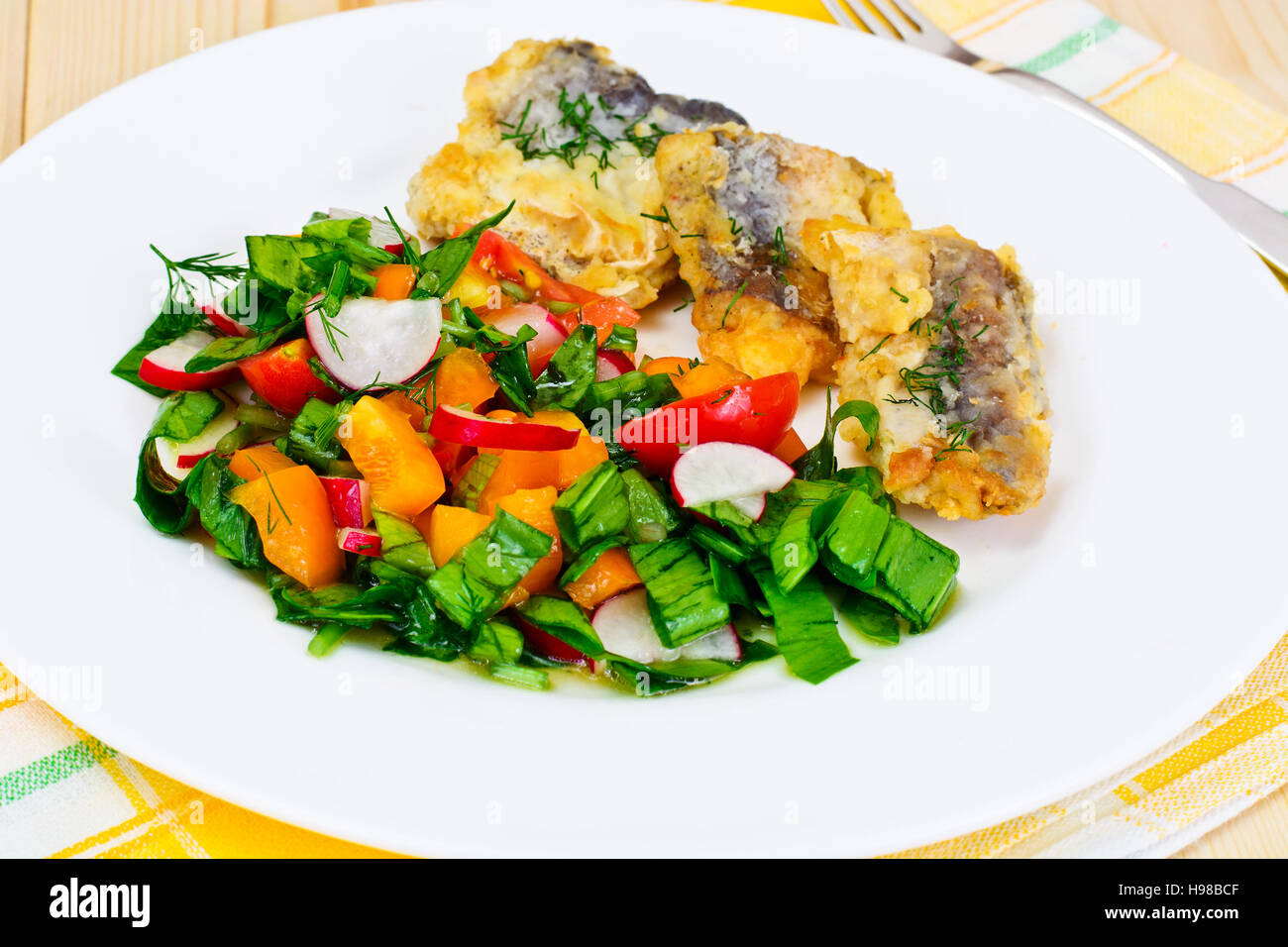Vegetables with Fish Fillet, Breaded Studio Photo Stock Photo - Alamy