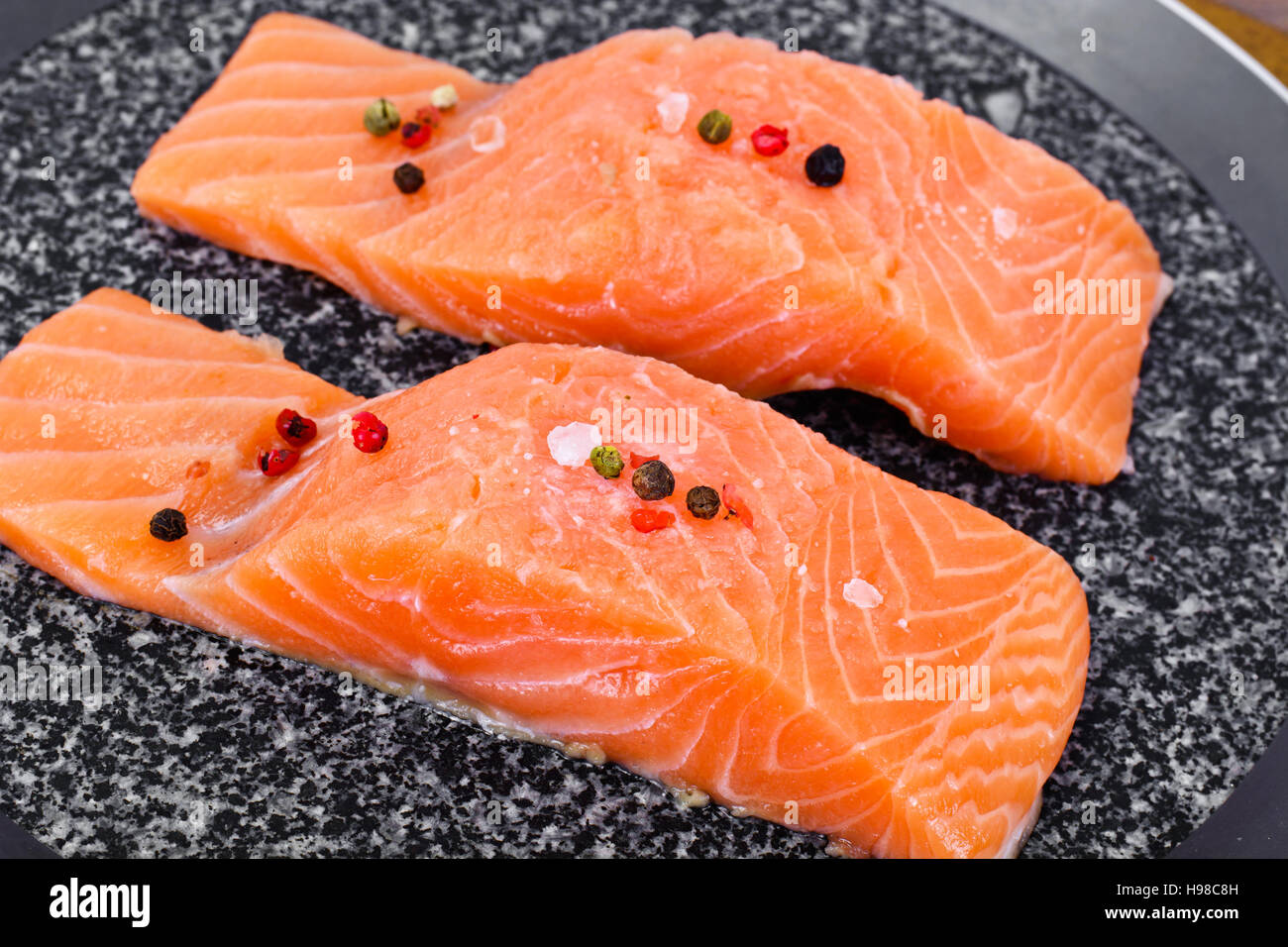 Fresh Salmon on White Plate. Studio Photo Stock Photo - Alamy