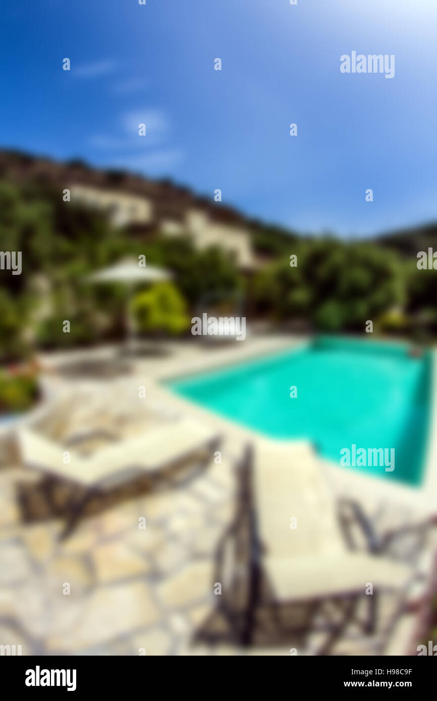 Abstract blurred photo of a Swimming Pool under Blue Summer Sky, ready ...