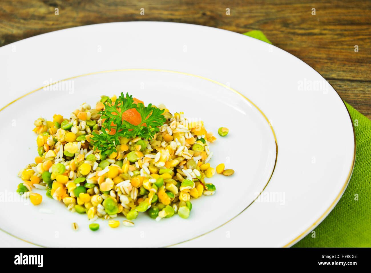 Side Dish of Lentils, Peas, Barley Maize and Rice on White Plate Stock ...
