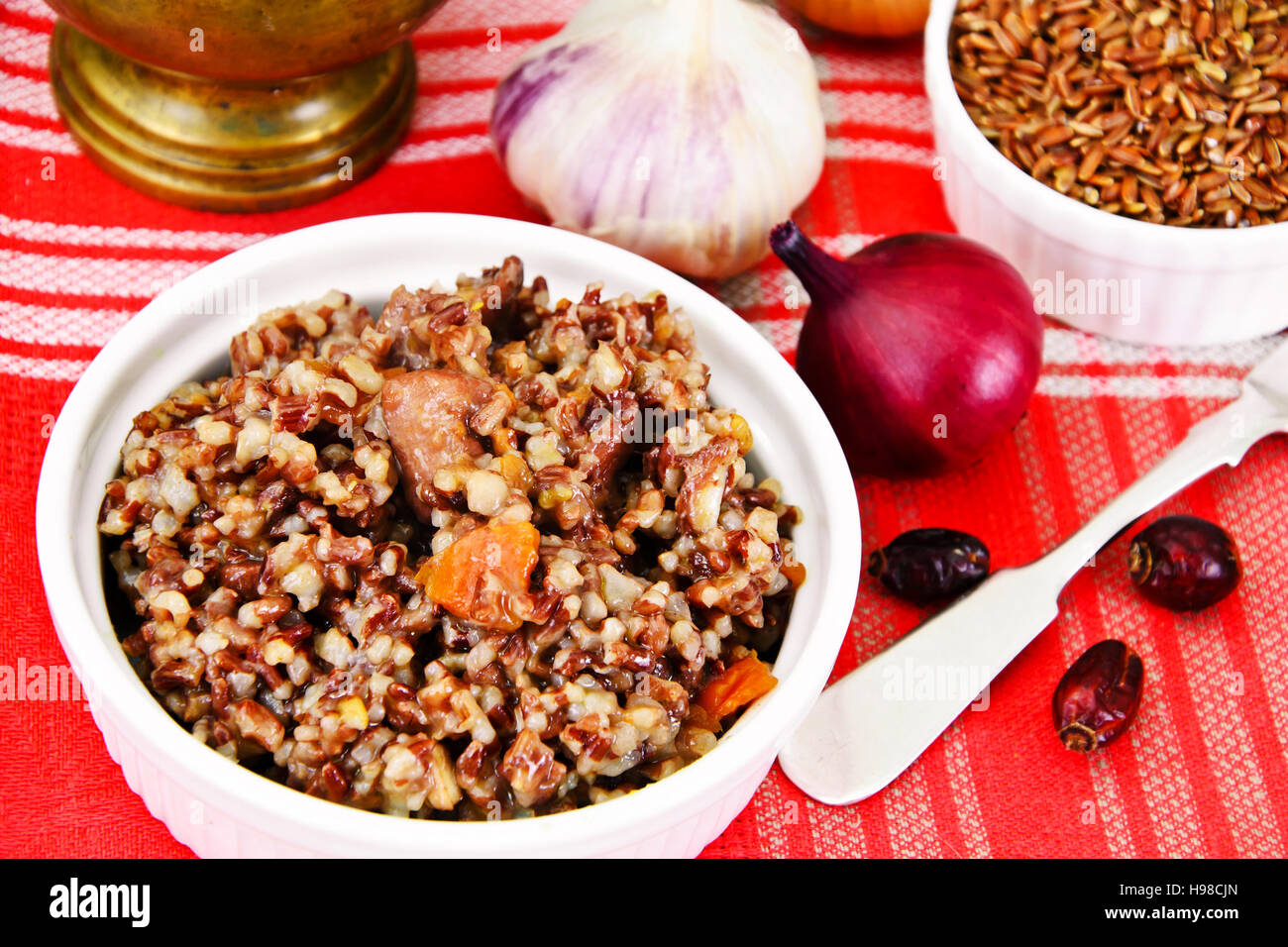 Pilaf with Meat, Carrots and Red Rice Studio Photo Stock Photo - Alamy