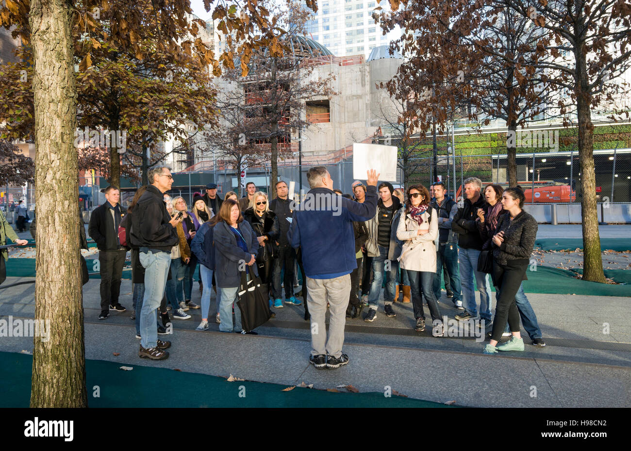 Tour guide lecturing a tour group at the World Trade Center in Lower ...