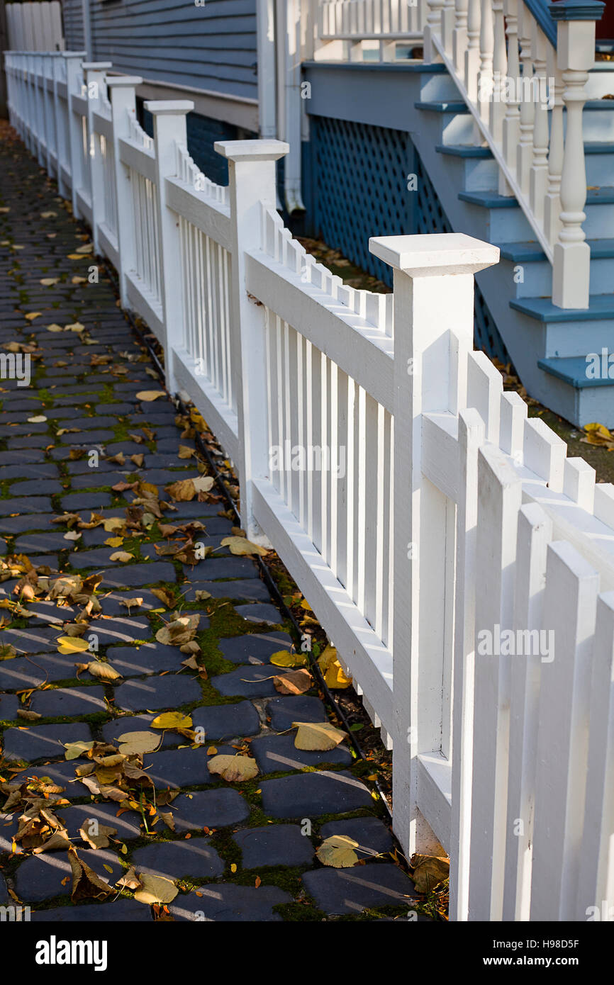 Brick house picket fence hi-res stock photography and images - Alamy