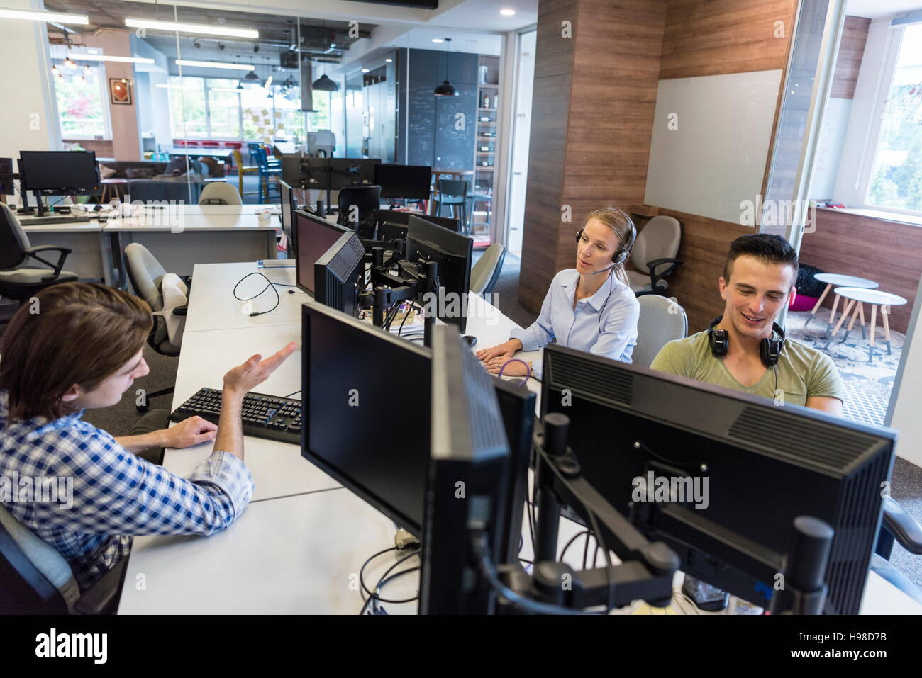 young business people at modern office workplace getting social in free ...