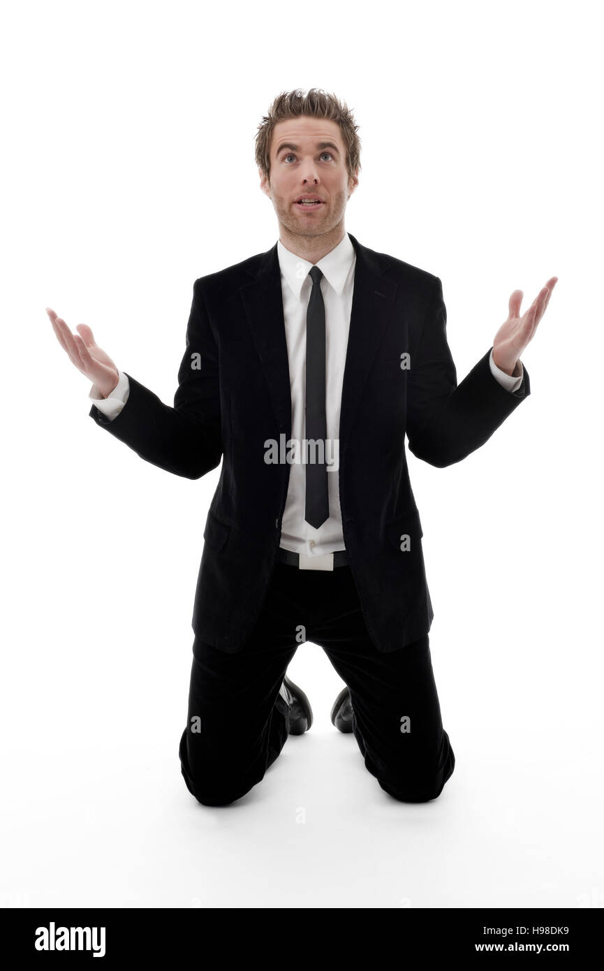 Person kneeling with arm raised hi-res stock photography and images - Alamy