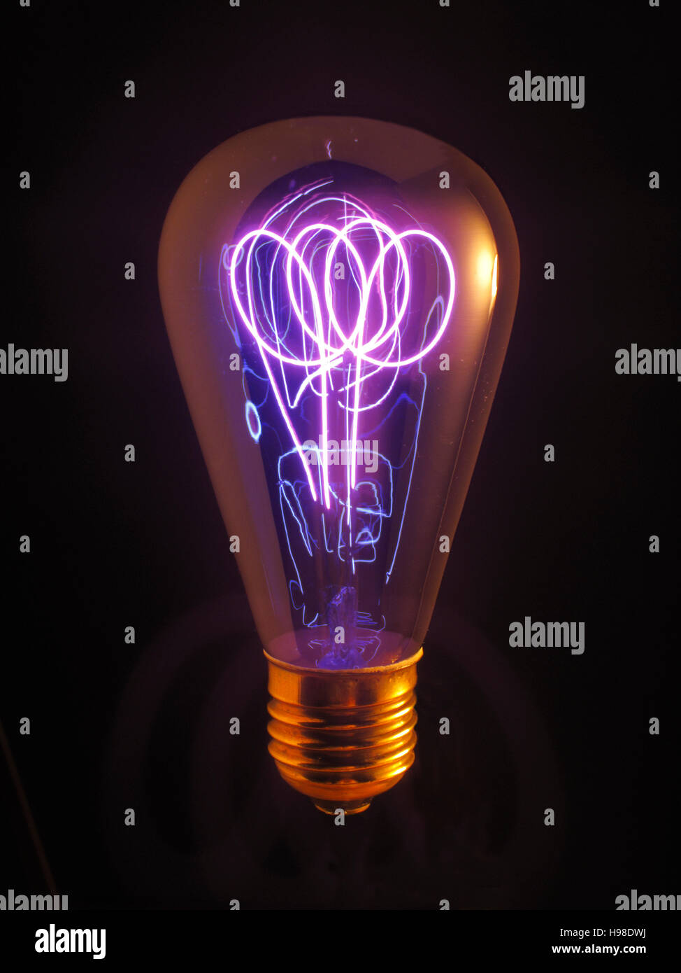 Purple lightbulbs hi-res stock photography and images - Alamy