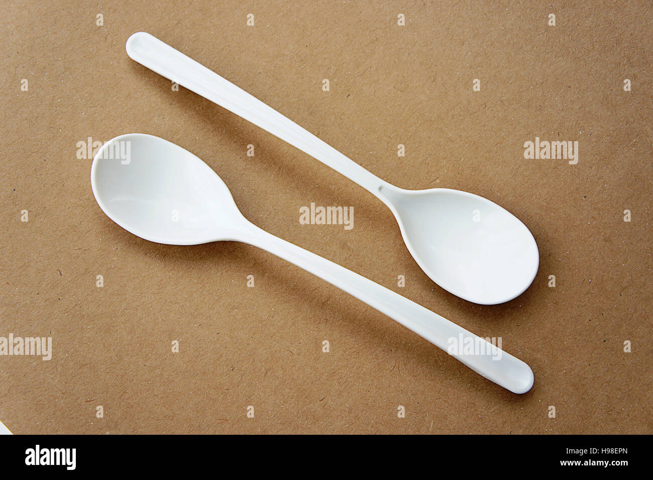 the twin spoon white on background , two spoon Stock Photo - Alamy