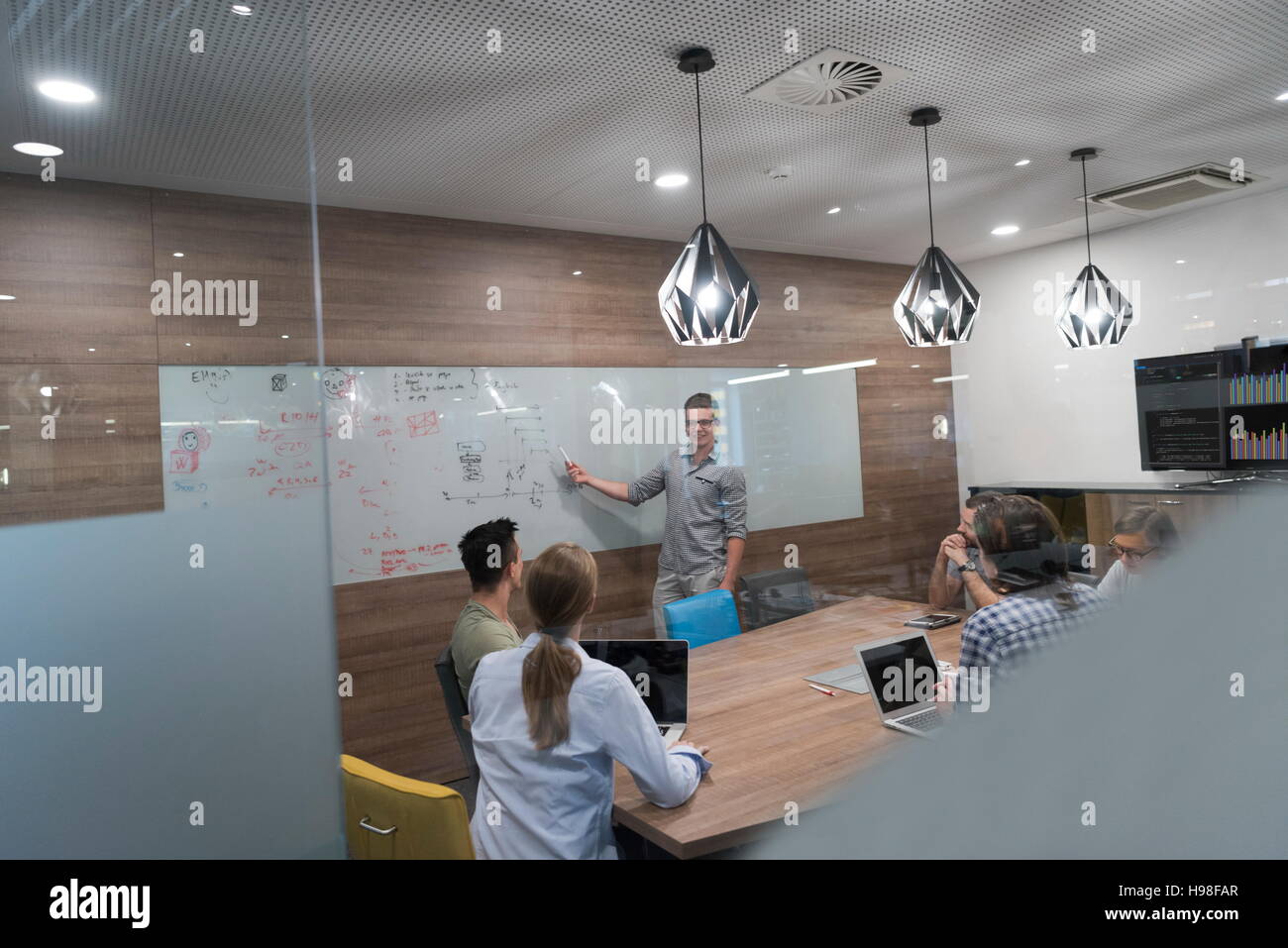 startup business team brainstorming on meeting working on laptop and ...