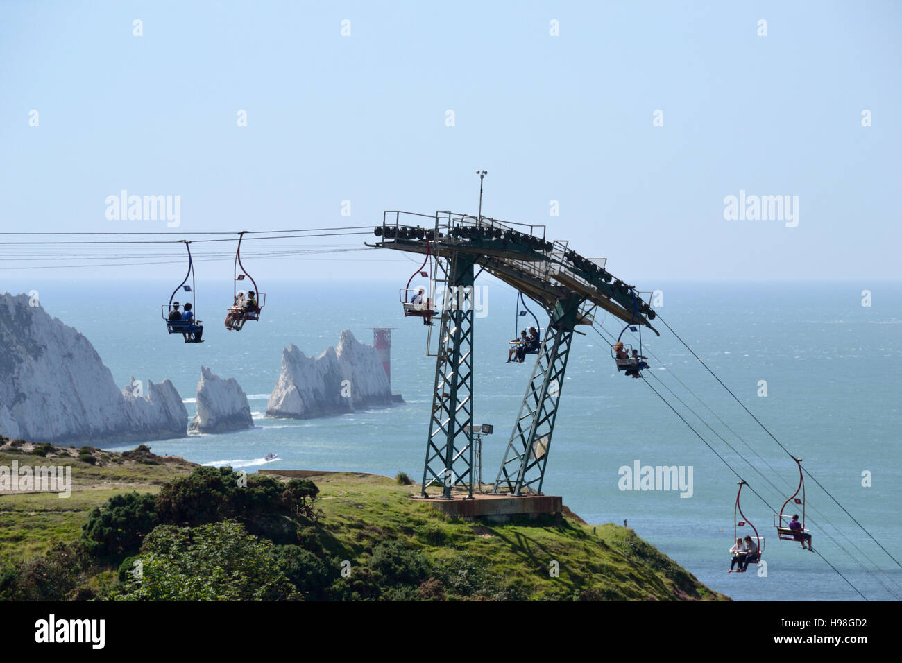 The chairlift at Alum Bay with the Needles Rocks and Lighthouse jutting ...