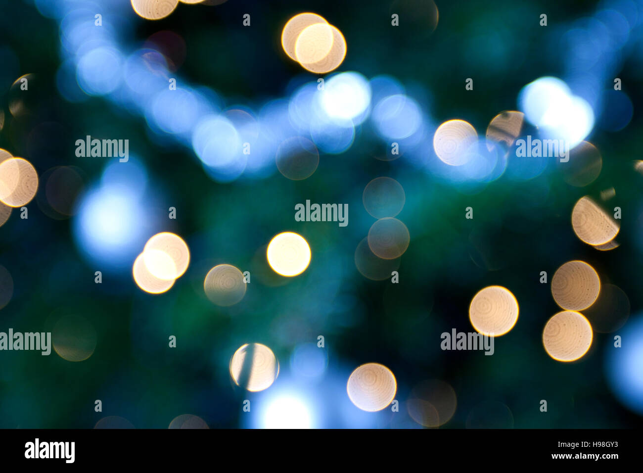 Blue and white lights as holiday background Stock Photo - Alamy