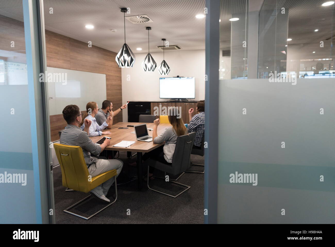 startup business team brainstorming on meeting working on laptop and ...