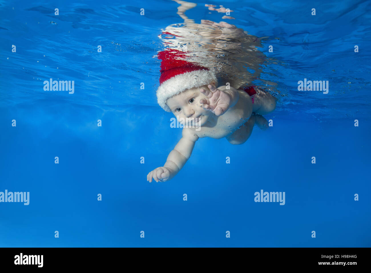 Red swimming cap hi-res stock photography and images - Alamy