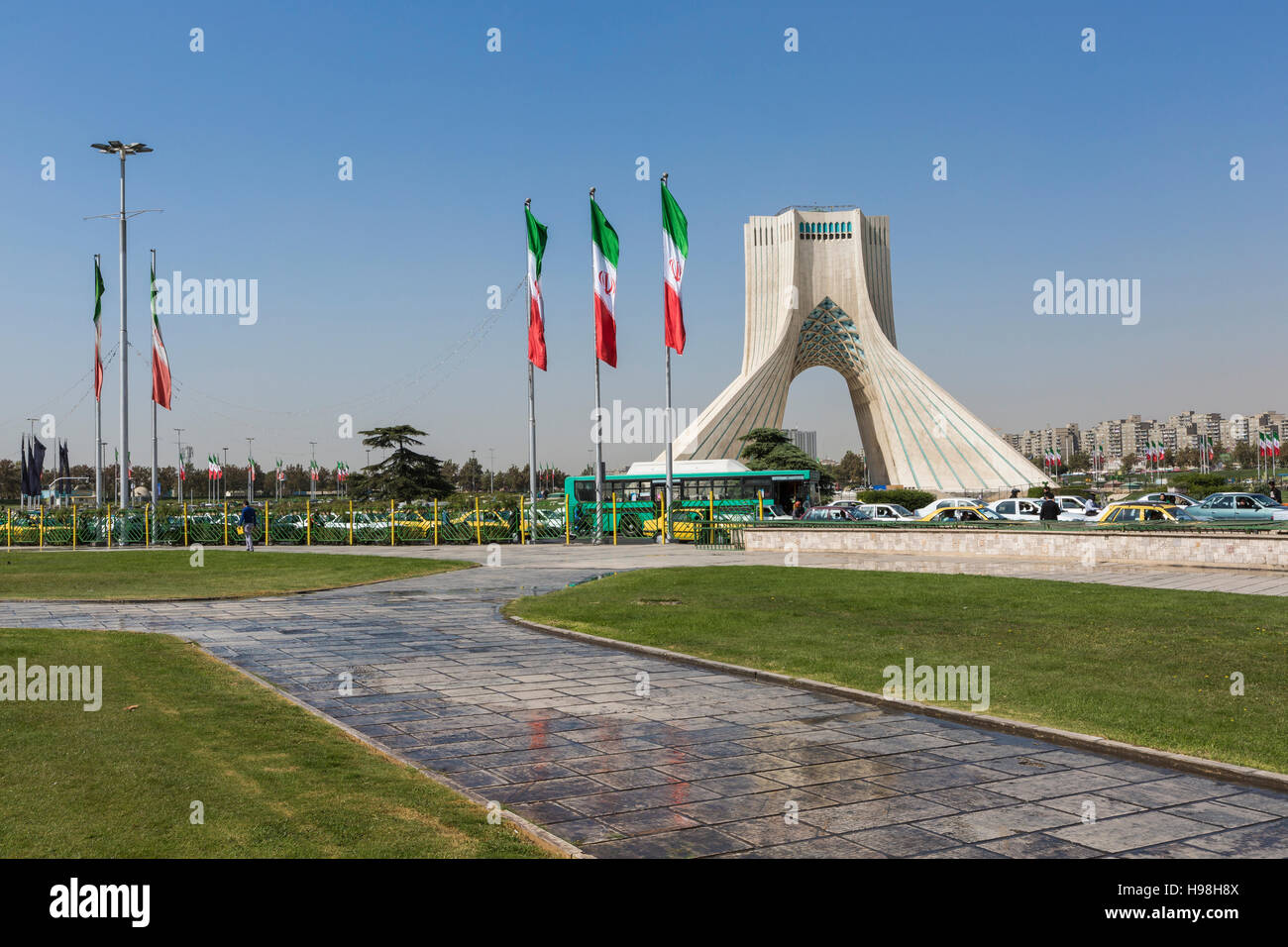 TEHERAN, IRAN - OCTOBER 03, 2016: Azadi Tower with flasgs of Iran ...