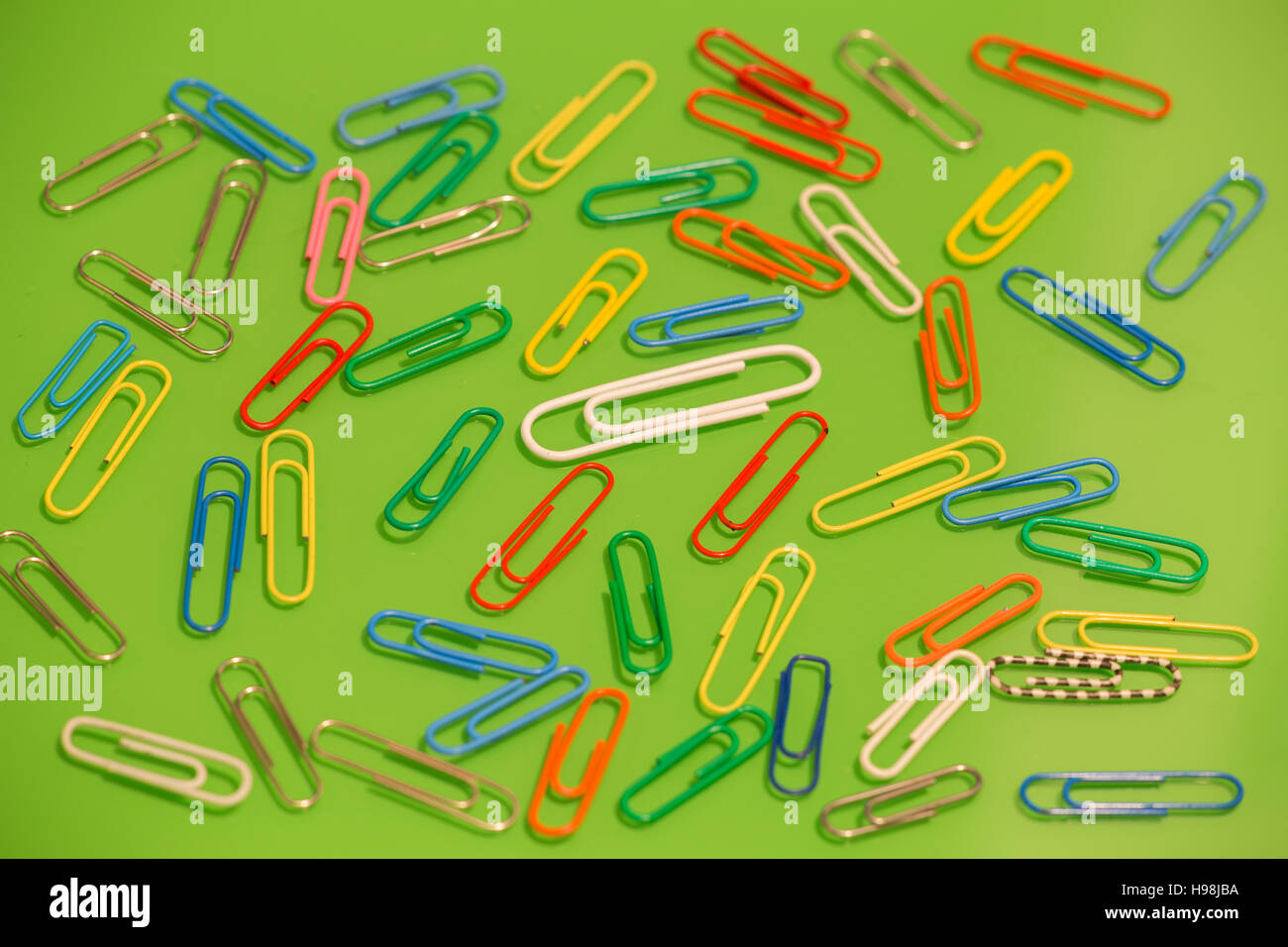 Paper clips / background Stock Photo - Alamy