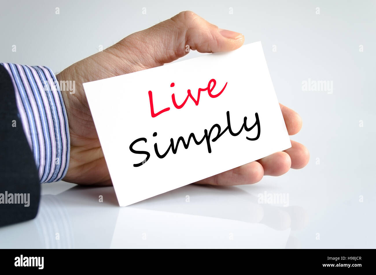 Live simply text concept isolated over white background Stock Photo - Alamy