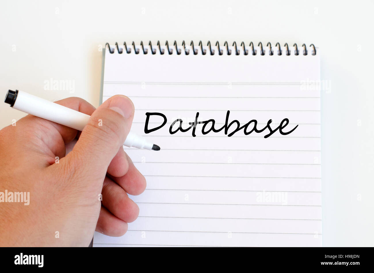 Database text concept write on notebook Stock Photo - Alamy
