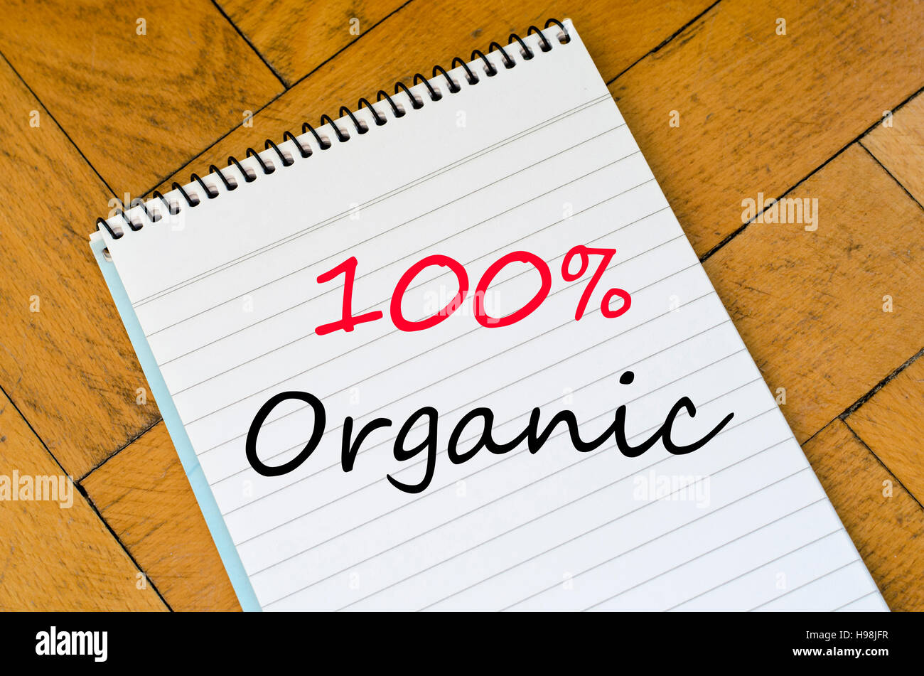 100% organic text concept write on notebook Stock Photo - Alamy