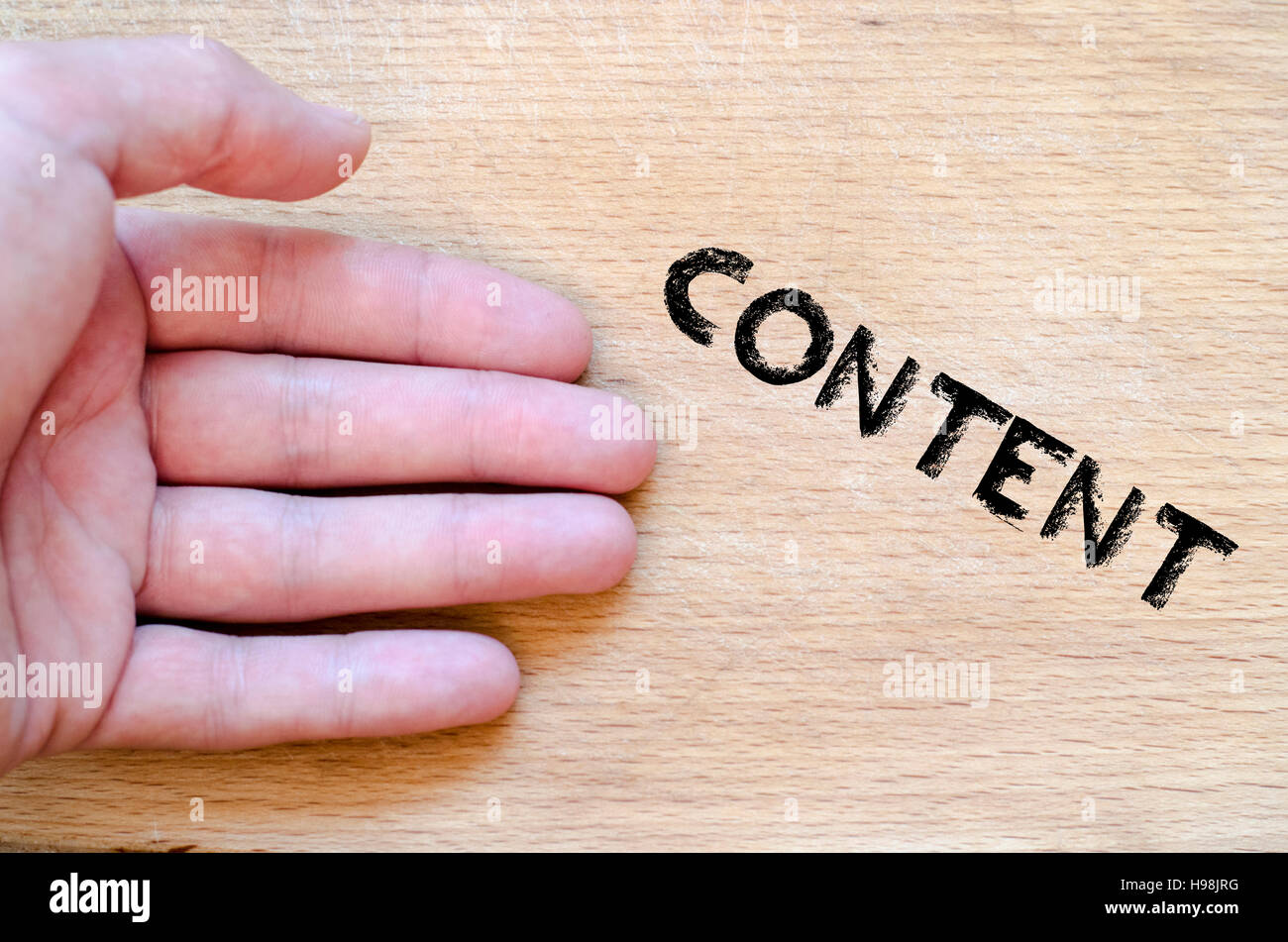 Human hand over wooden background and content text concept Stock Photo ...