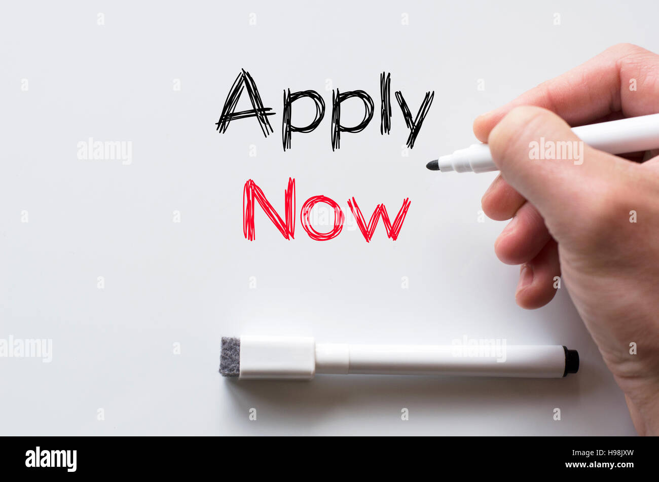 Human hand writing apply now on whiteboard Stock Photo - Alamy