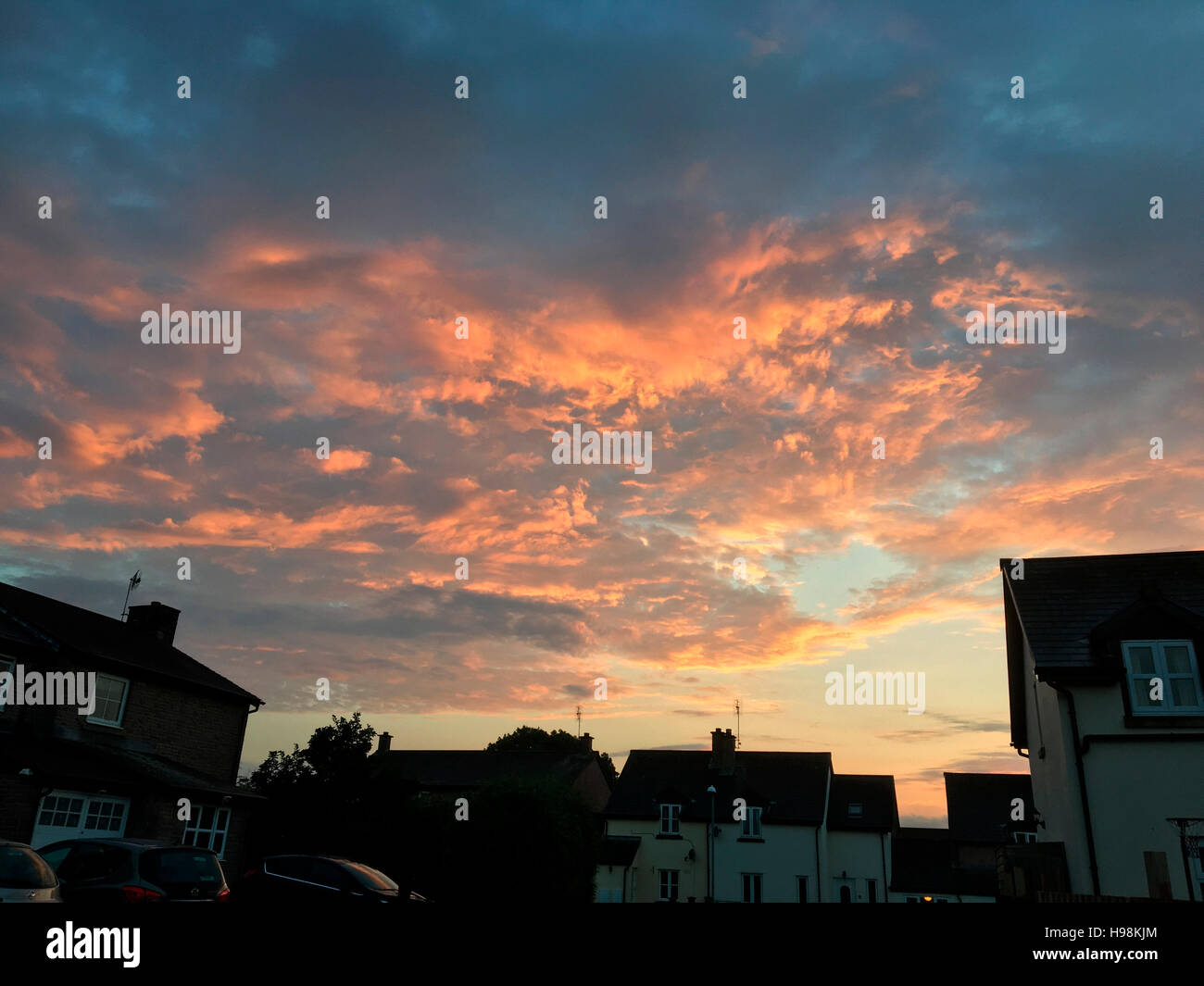 Dramatic sunset over housing estate in Hay on Wye Powys Wales UK Stock ...