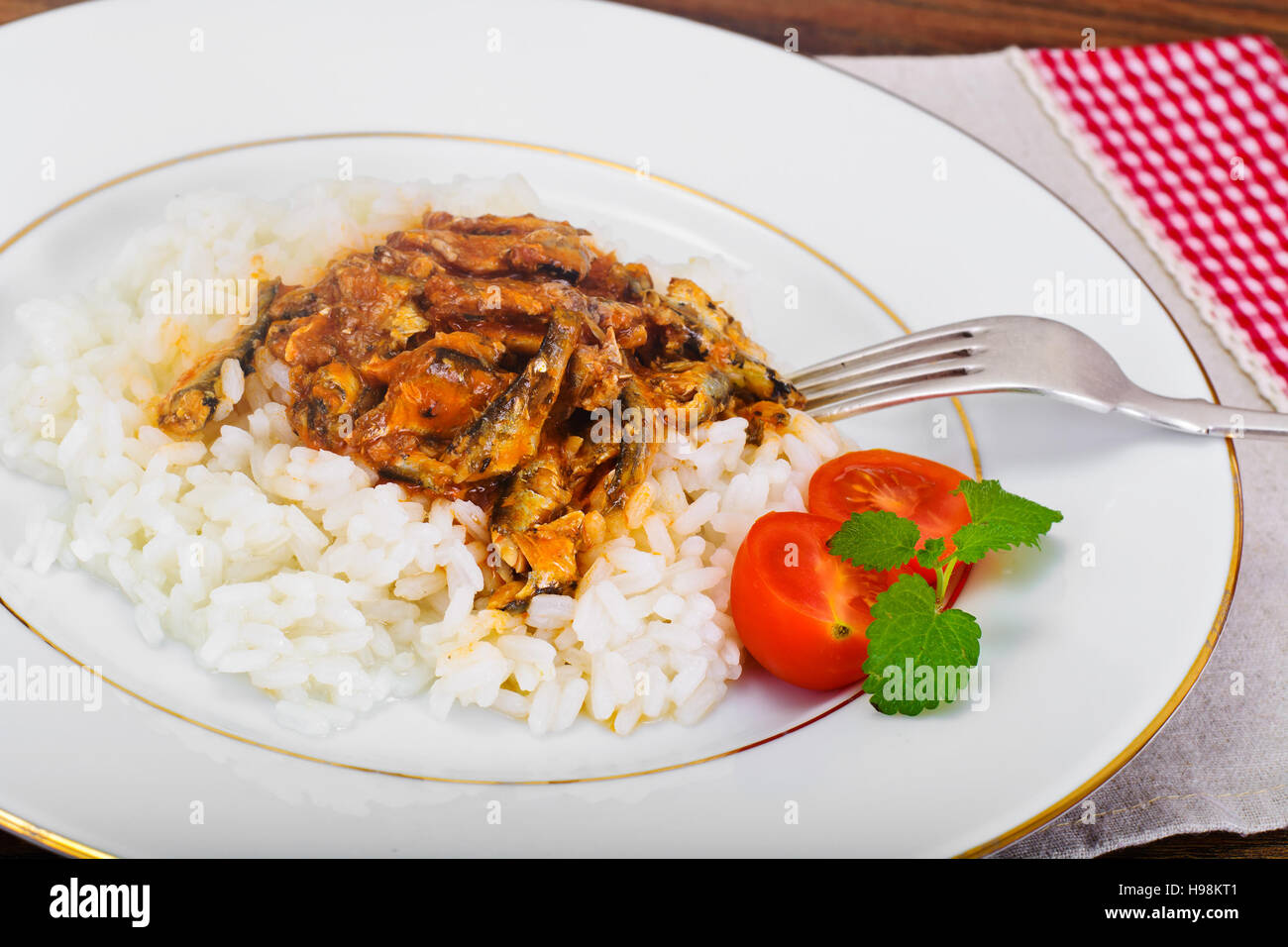 Rice with Canned Fish in Tomato Sauce Studio Photo Stock Photo - Alamy