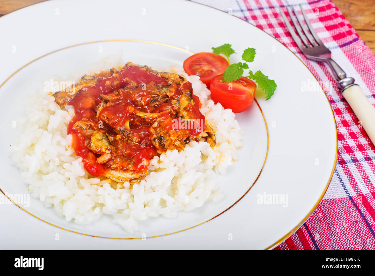Rice with Canned Fish in Tomato Sauce Studio Photo Stock Photo - Alamy