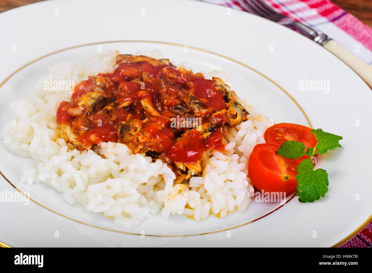 Rice with Canned Fish in Tomato Sauce Studio Photo Stock Photo - Alamy
