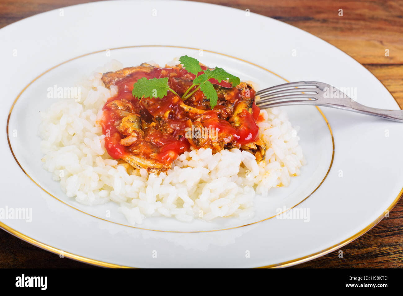 Rice with Canned Fish in Tomato Sauce Studio Photo Stock Photo - Alamy