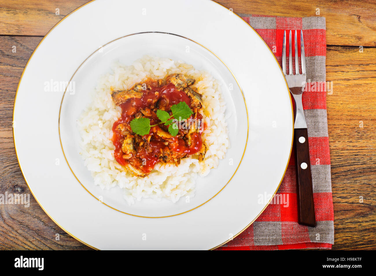 Rice with Canned Fish in Tomato Sauce Studio Photo Stock Photo - Alamy