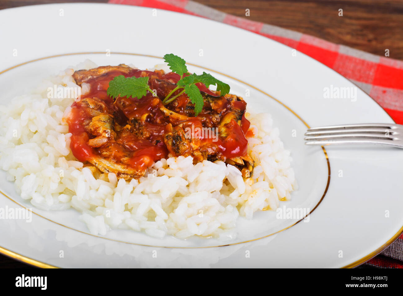 Rice with Canned Fish in Tomato Sauce Studio Photo Stock Photo - Alamy
