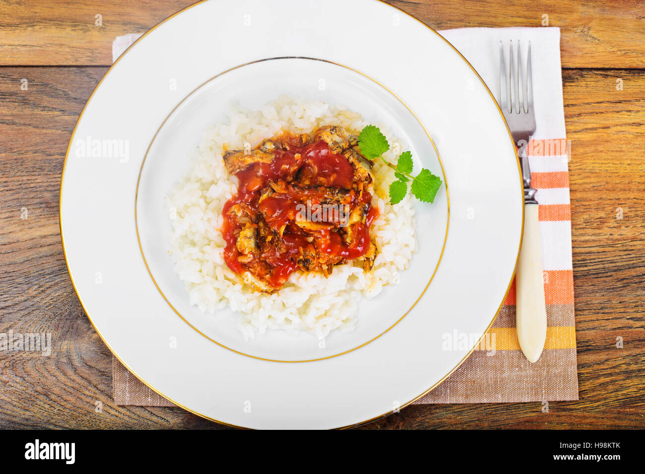 Rice with Canned Fish in Tomato Sauce Studio Photo Stock Photo - Alamy
