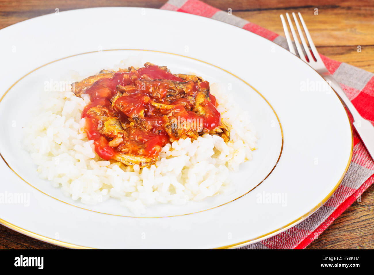 Rice with Canned Fish in Tomato Sauce Studio Photo Stock Photo - Alamy