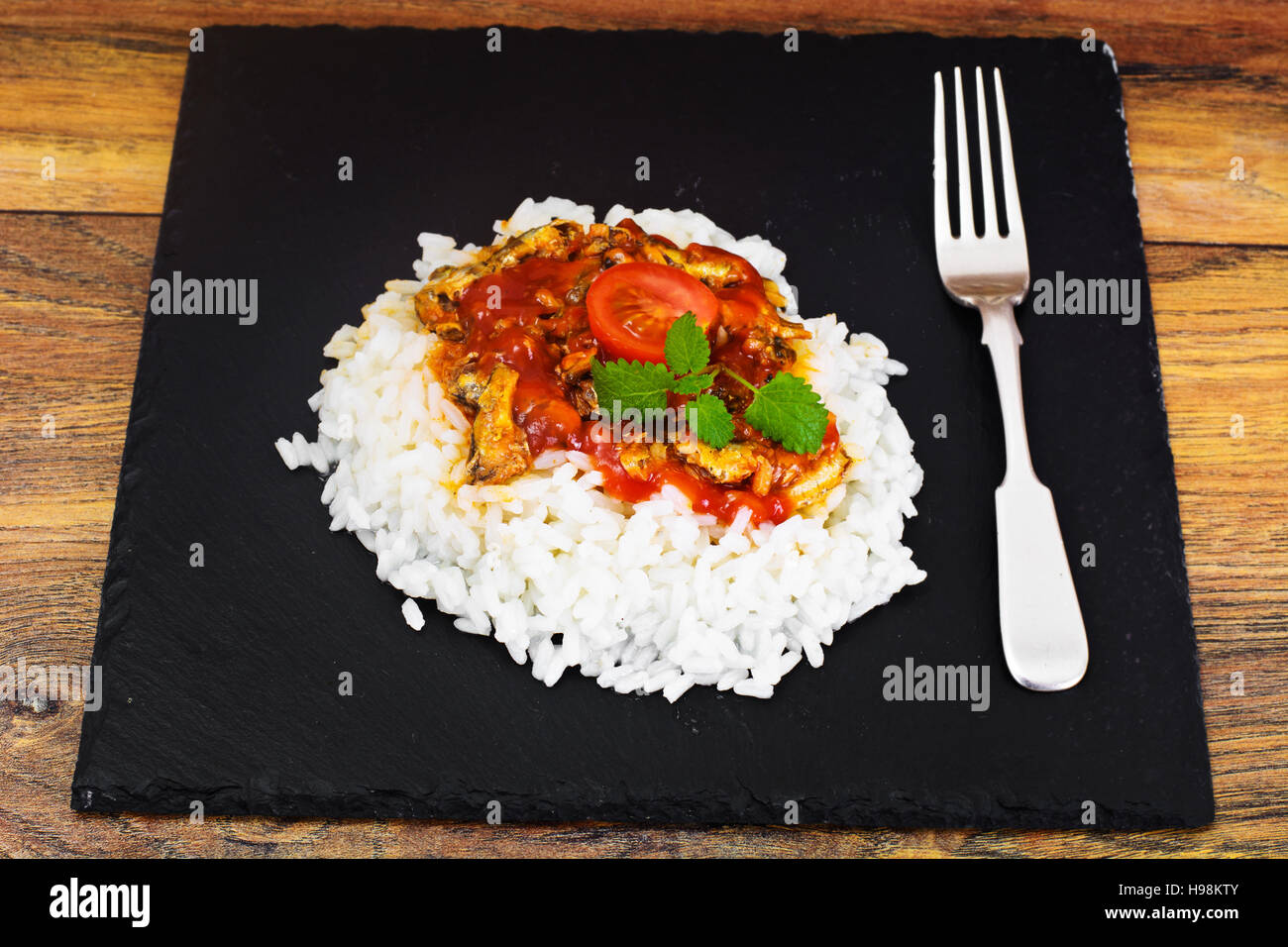 Rice with Canned Fish in Tomato Sauce Studio Photo Stock Photo - Alamy