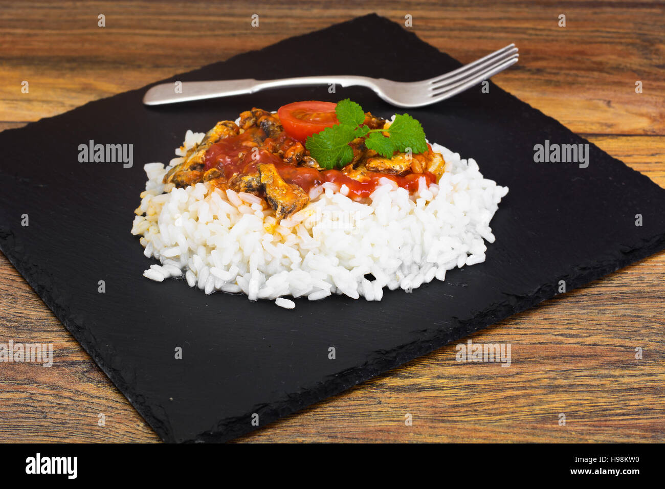 Rice with Canned Fish in Tomato Sauce Studio Photo Stock Photo - Alamy