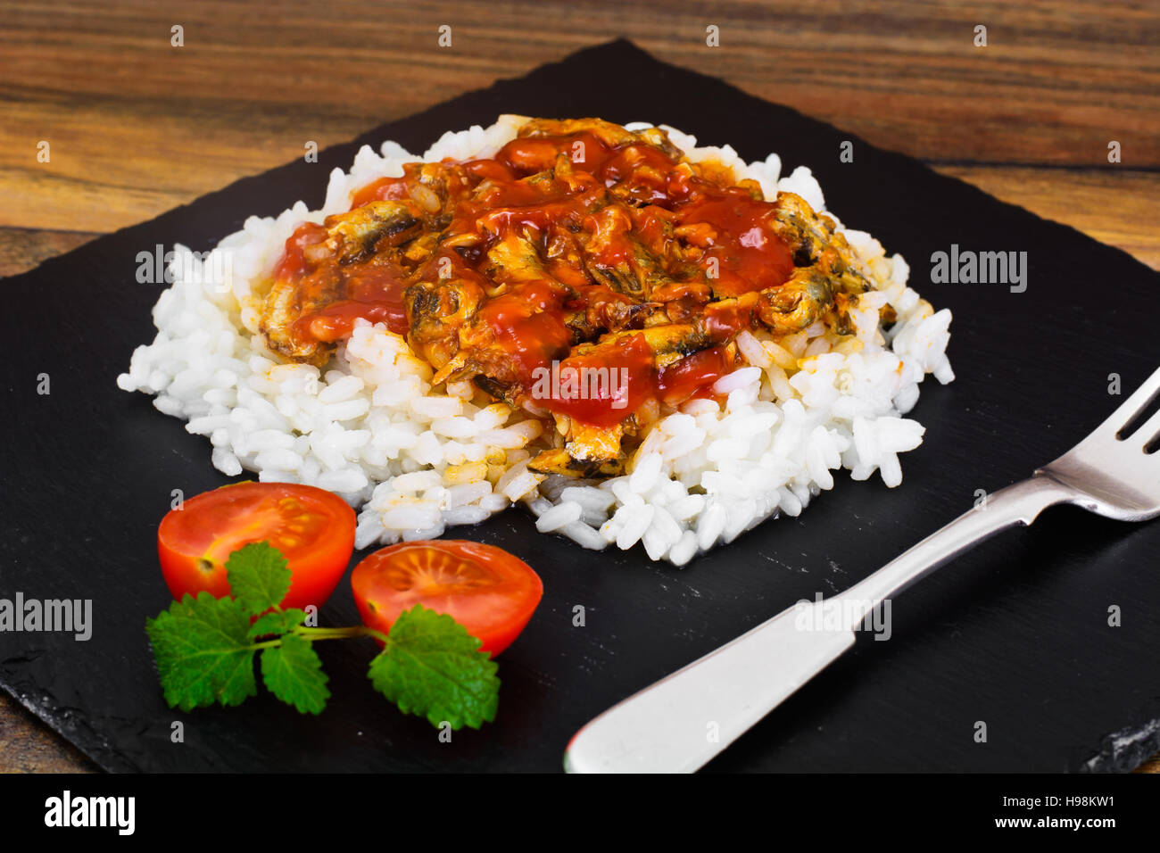 Rice with Canned Fish in Tomato Sauce Studio Photo Stock Photo - Alamy