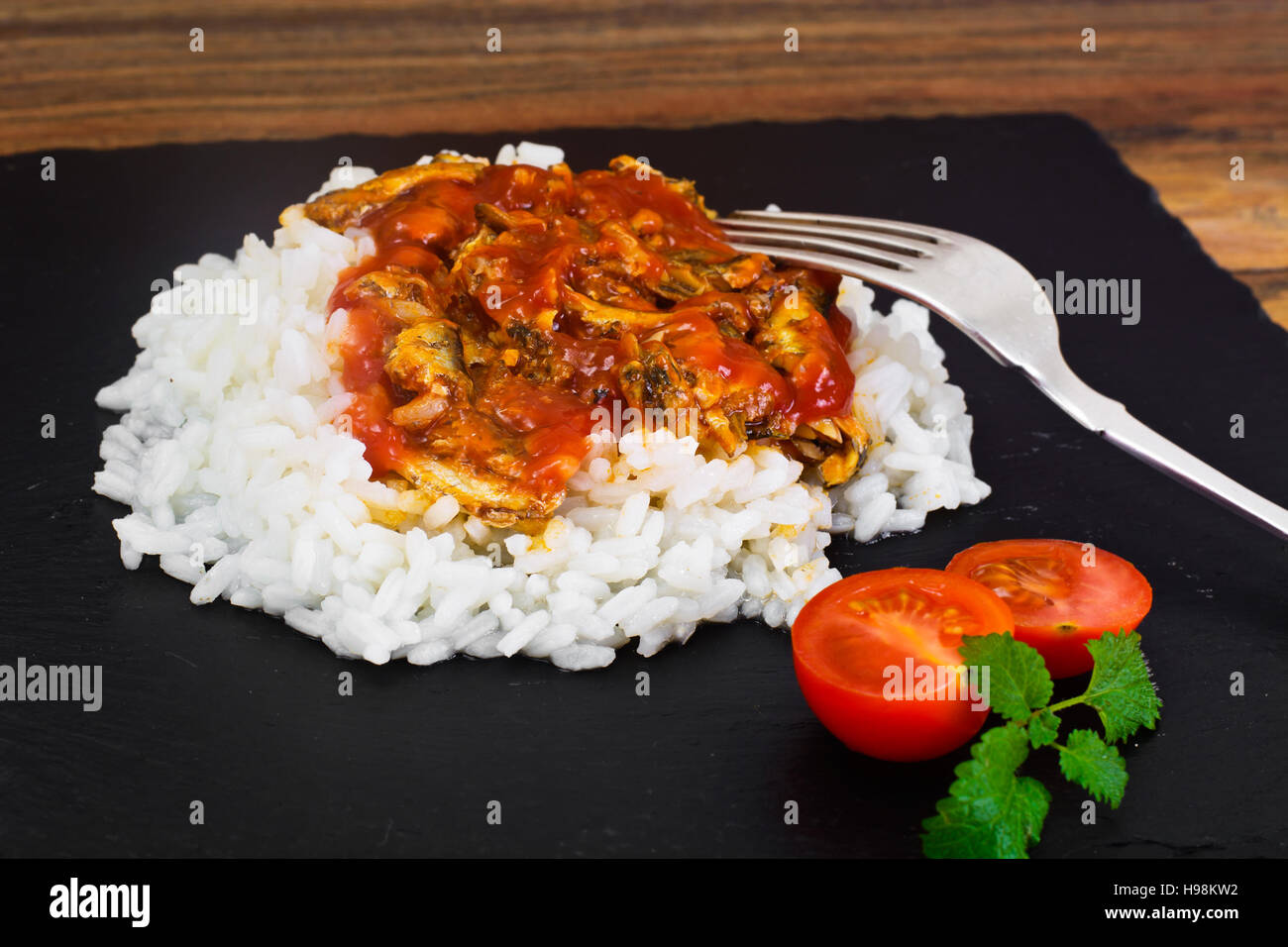 Rice with Canned Fish in Tomato Sauce Studio Photo Stock Photo - Alamy