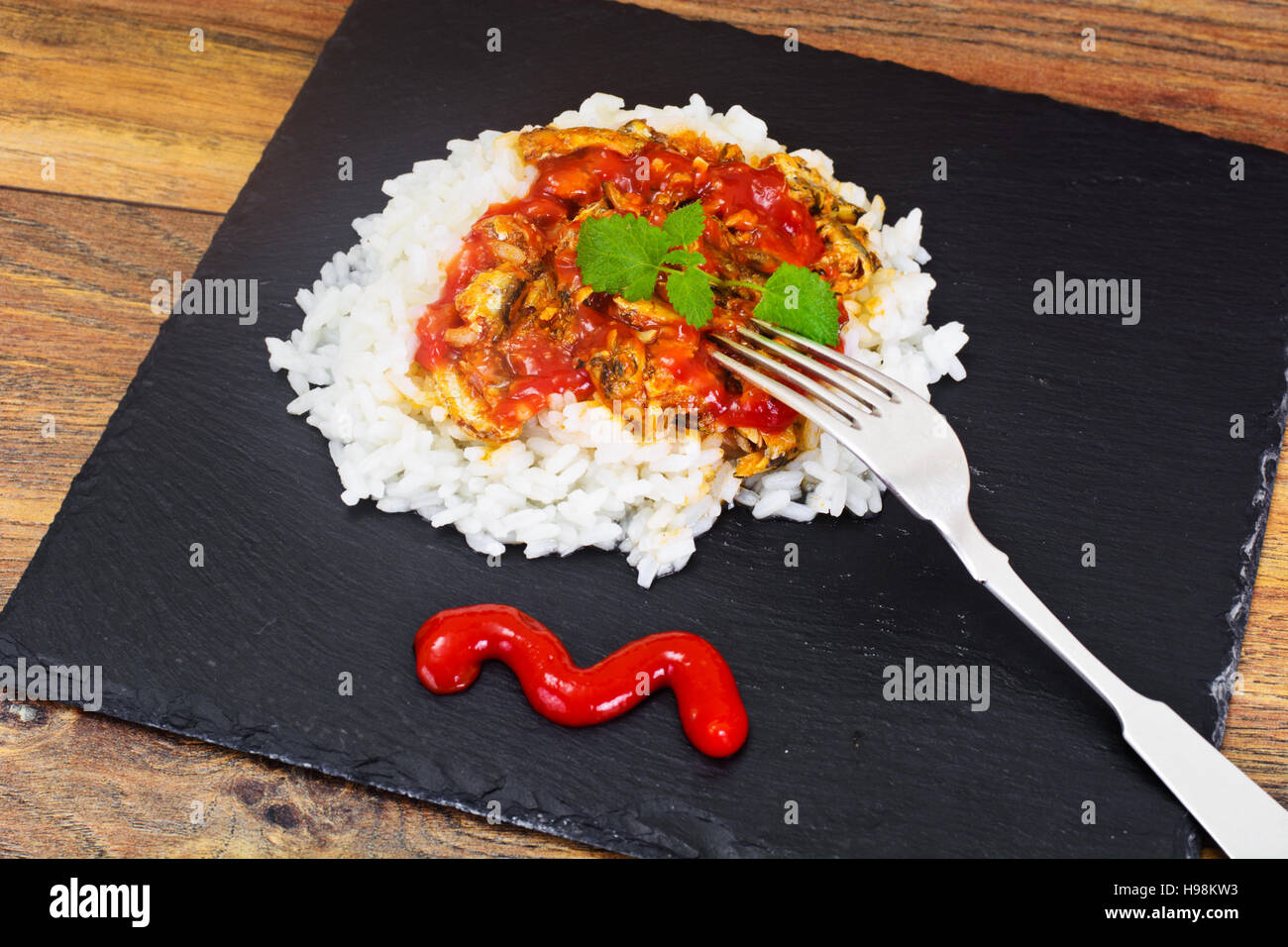 Rice with Canned Fish in Tomato Sauce Studio Photo Stock Photo - Alamy