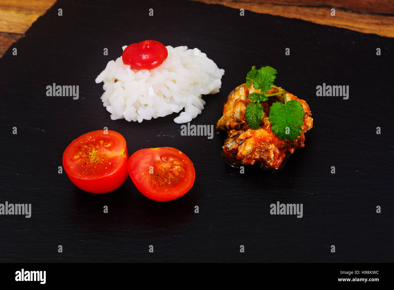 Rice with Canned Fish in Tomato Sauce Studio Photo Stock Photo - Alamy