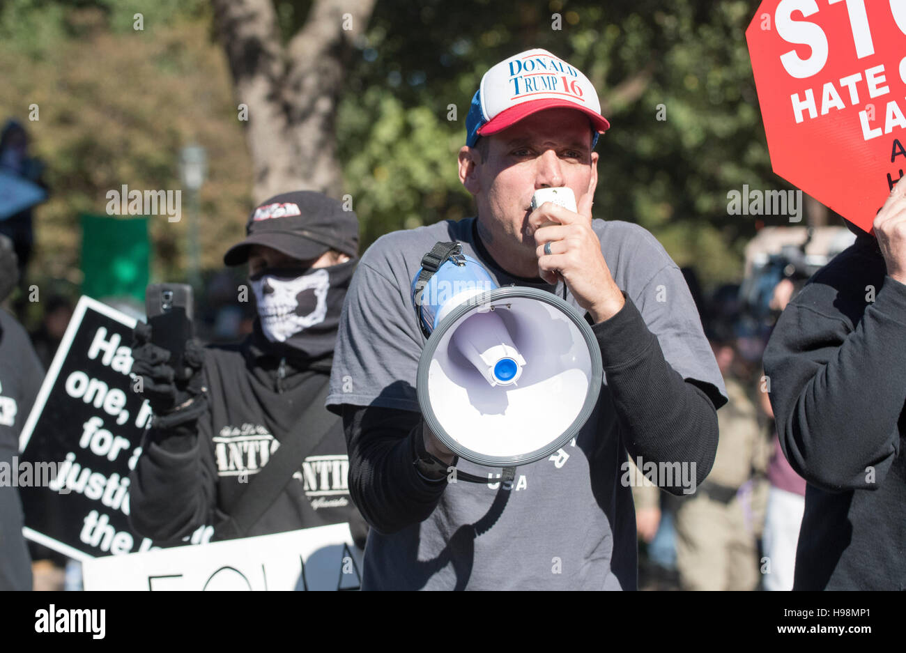 Participant in White Lives Matter rally uses bullhorn to speak to ...