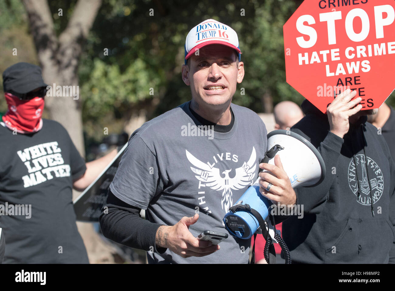 Participant in White Lives Matter rally uses bullhorn to speak to ...