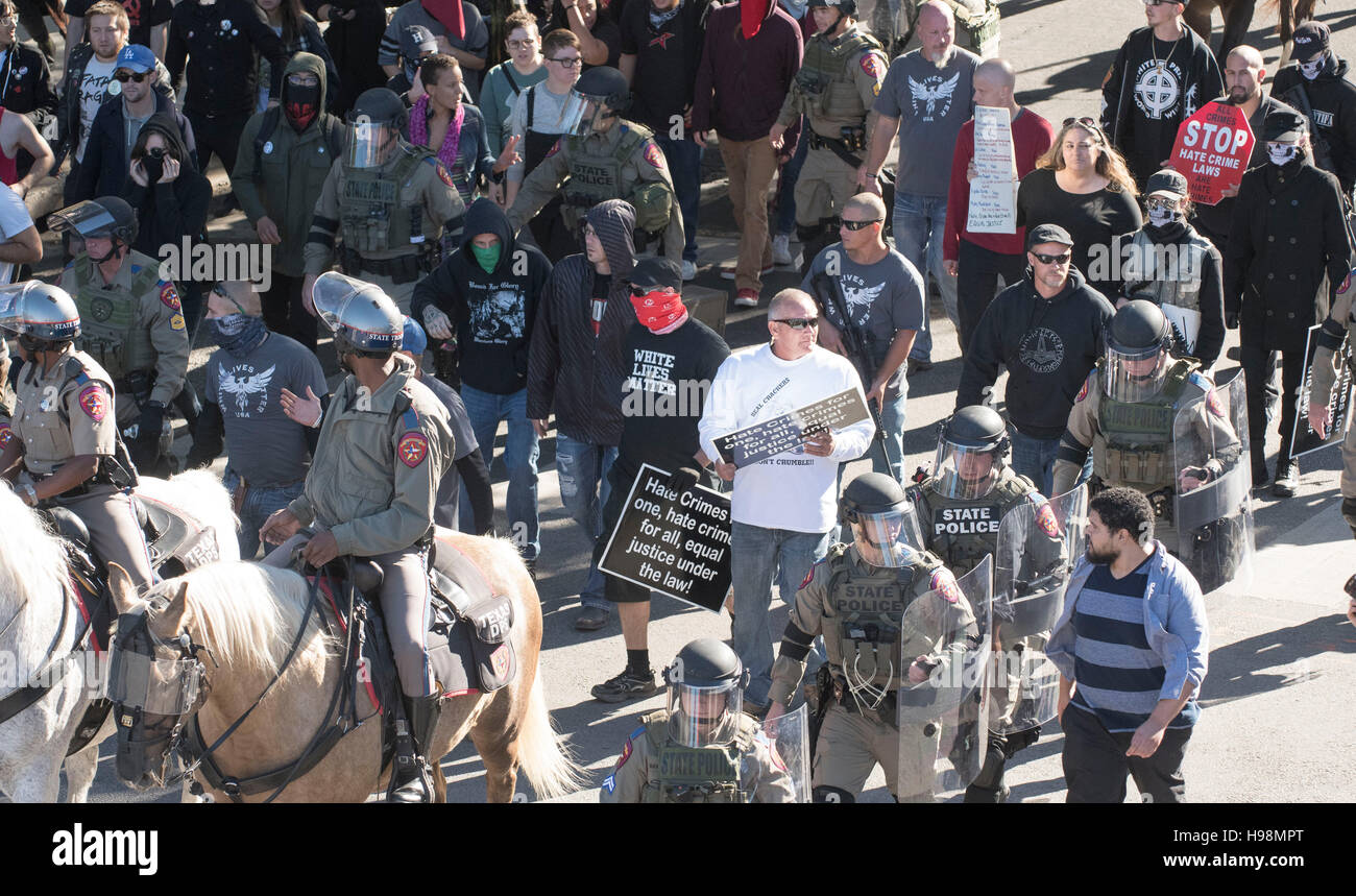 DPS officers in riot gear keep White Lives Matter marchers apart from ...