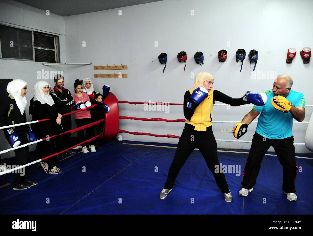 Damascus, Syria. 19th Nov, 2016. A Syrian woman boxer exercises at the ...