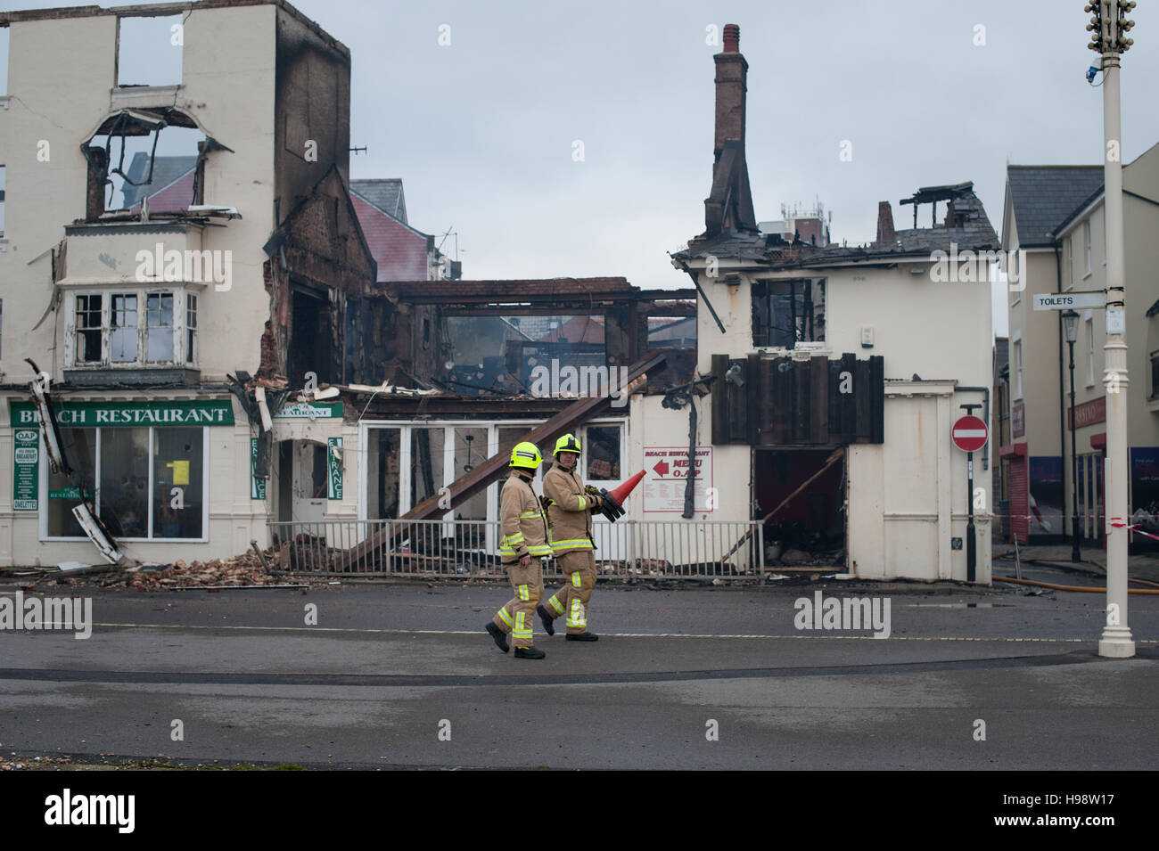 Firefighters attend the aftermath of a major fire at a building in ...