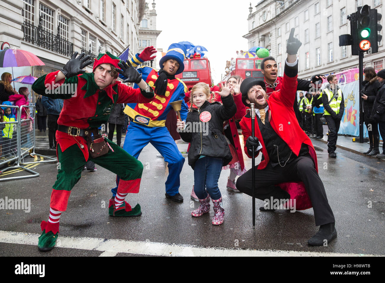 London, UK. 20 November 2016. Hamleys characters surround Leah as she ...