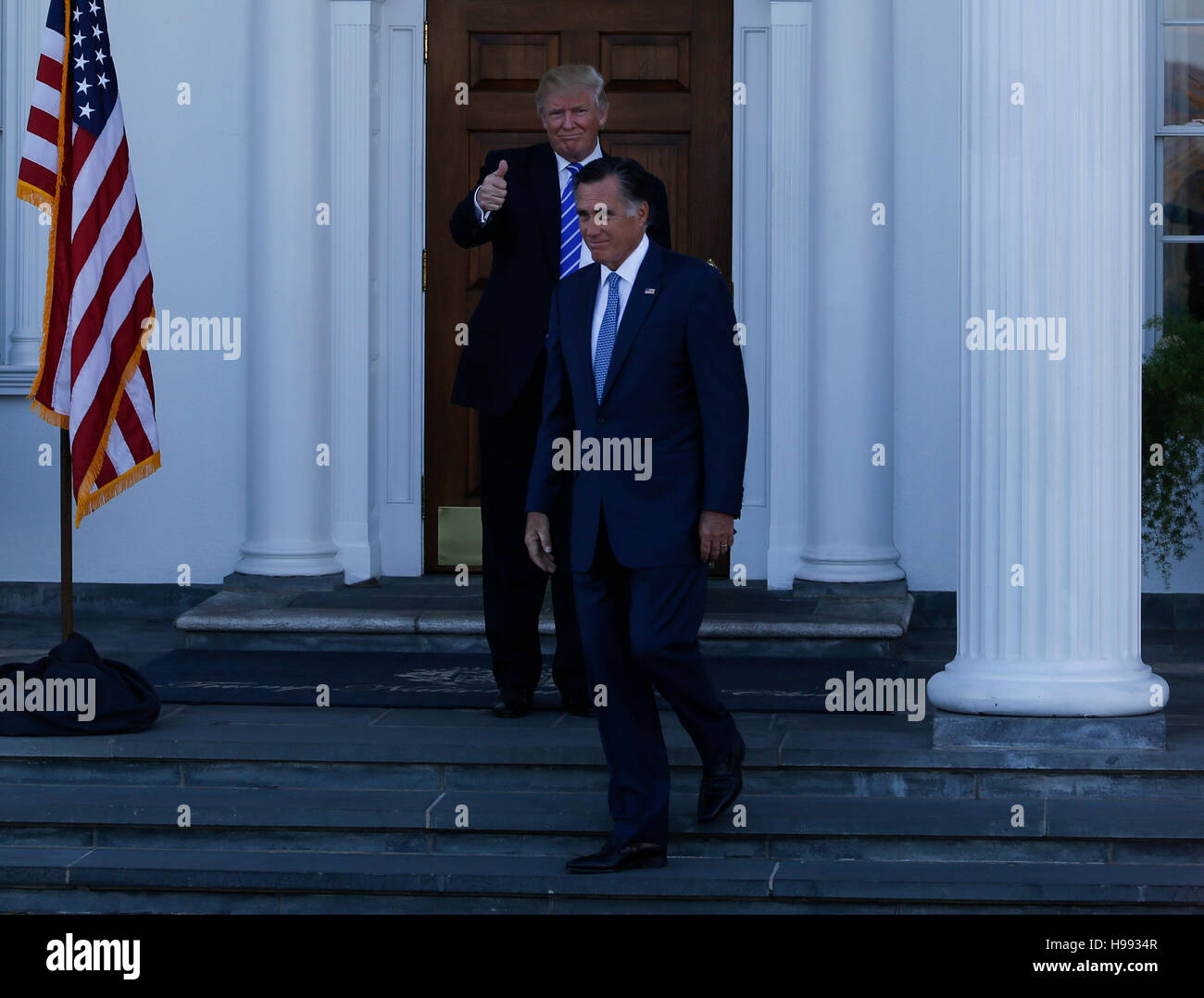 Mitt Romney (R) leaves after United States President-elect Donald Trump ...