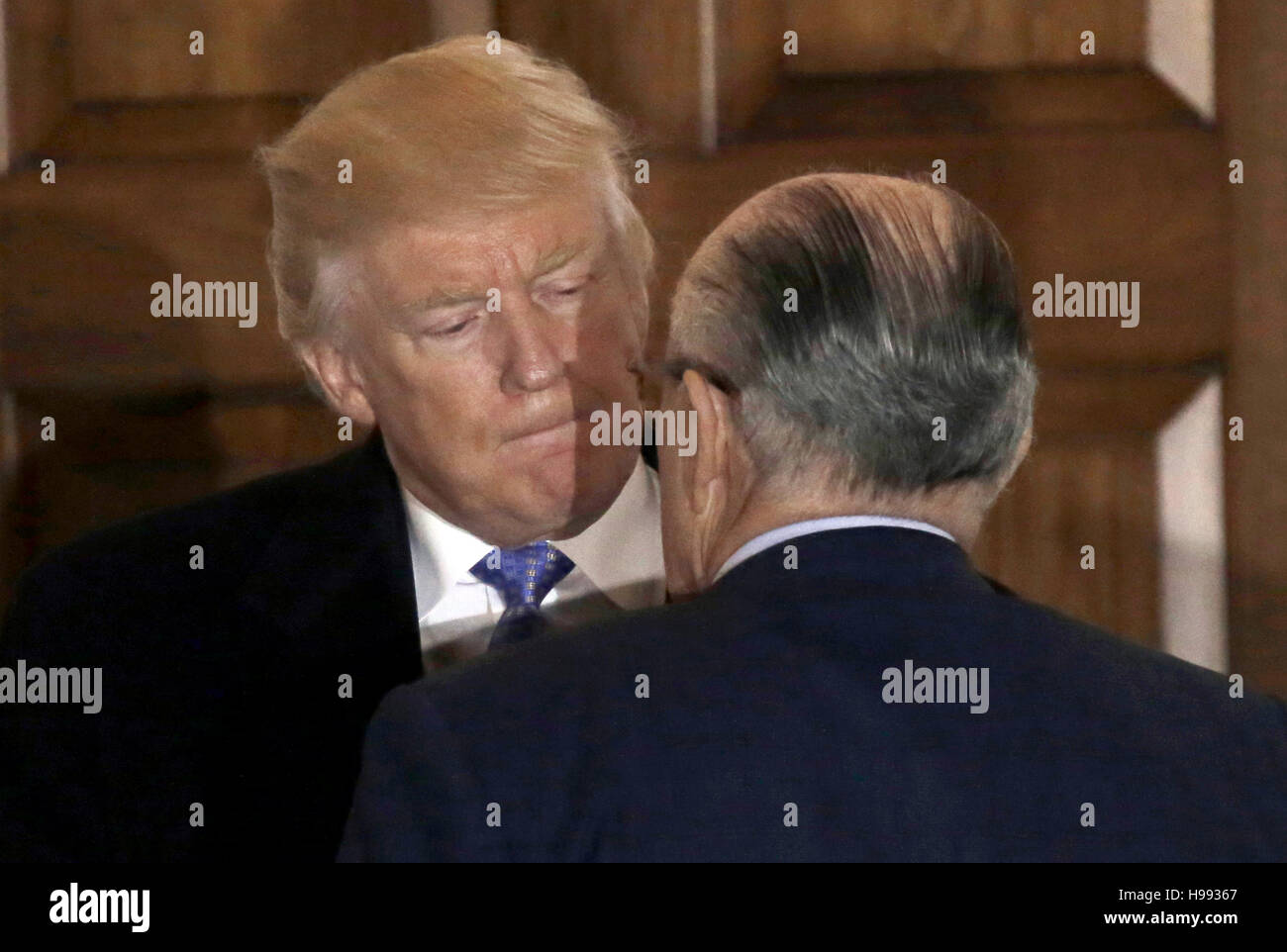 United States President-elect Donald Trump speaks with former New York ...