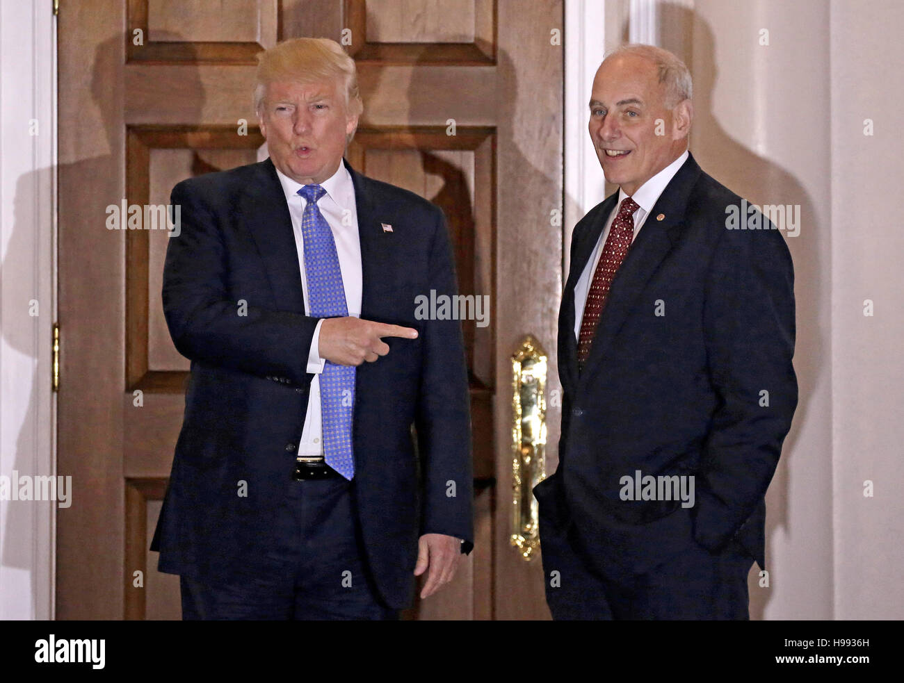 United States President-elect Donald Trump (L) gestures with retired US ...