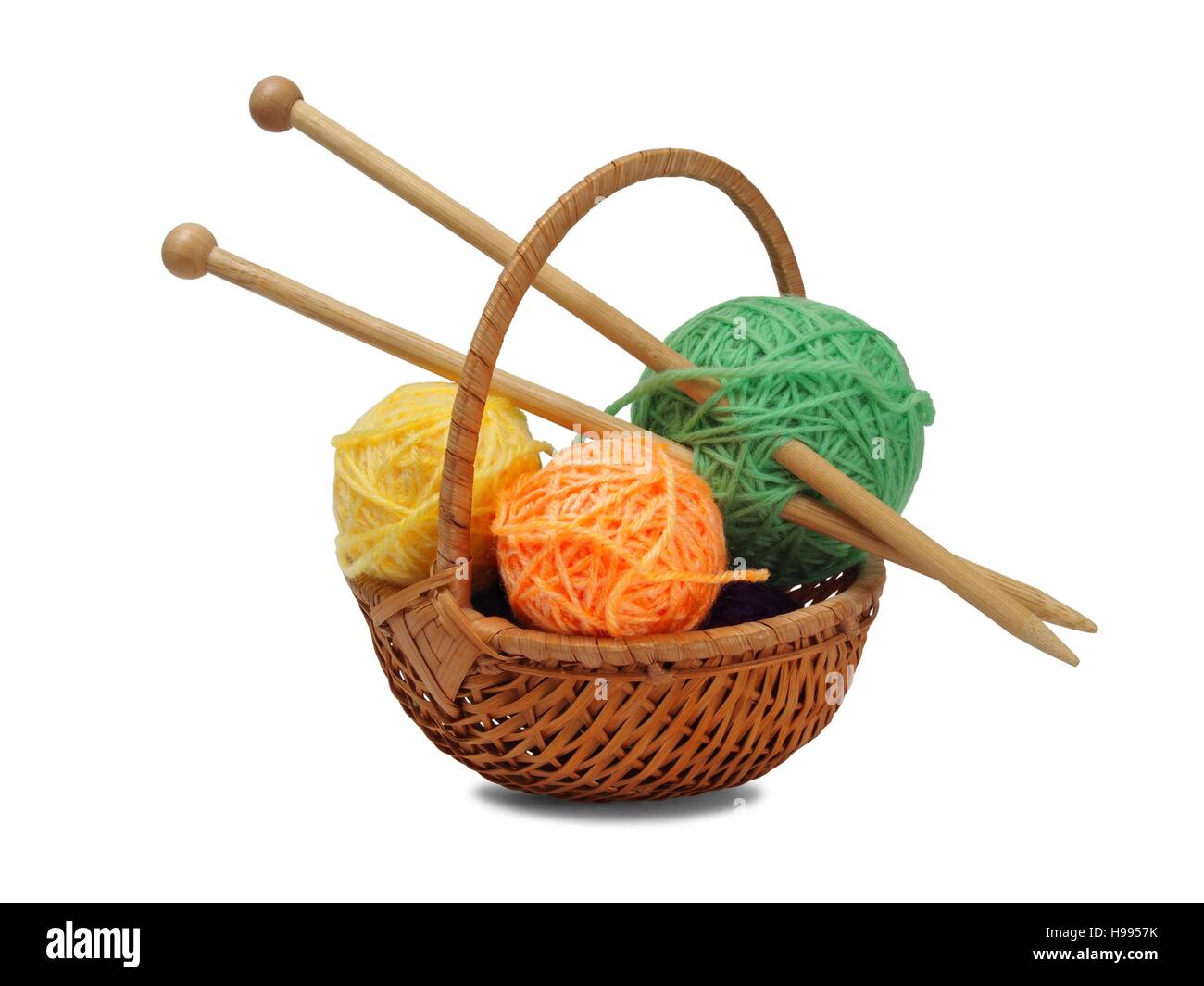 Basket with knitting wool and needles on white background Stock Photo ...