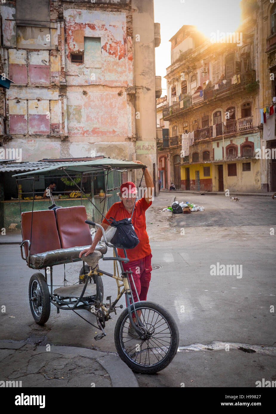 Havana, Cuba: Bicitaxi in a street scene, Old Havana Stock Photo - Alamy
